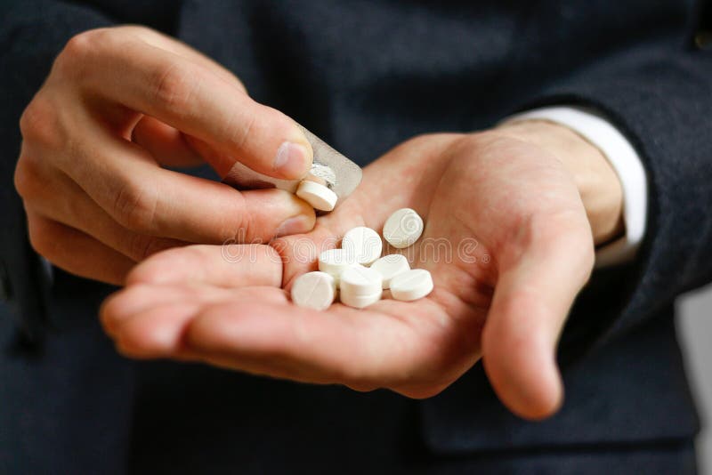 Close Up of Man`s Hand Taking Out Pills from Blister Pack Stock Photo ...