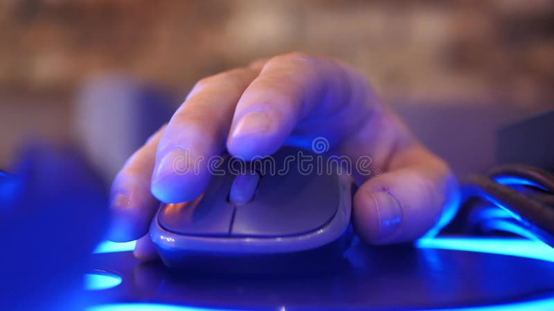 Close-up of a Man S Hand Using a Computer Mouse while Working on a ...