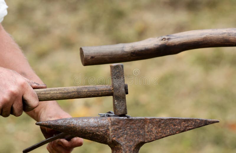 Close-up of Man`s Hand Using a Rustic Hammer Stock Photo - Image of ...