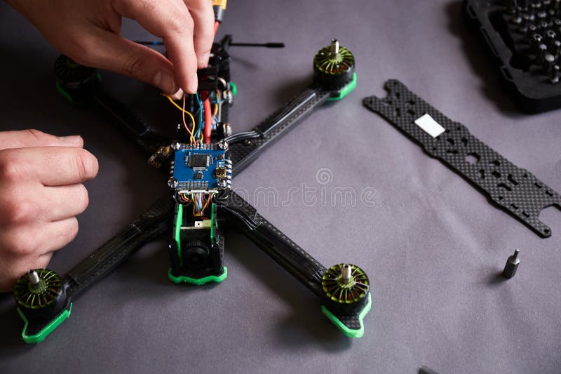 Close Up of Man S Hands Assembling a Drone from Parts, Using Tools ...