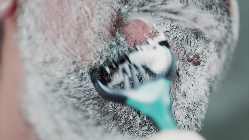 Close Up of a Man Shaving His Beard Stock Video - Video of face, handle ...