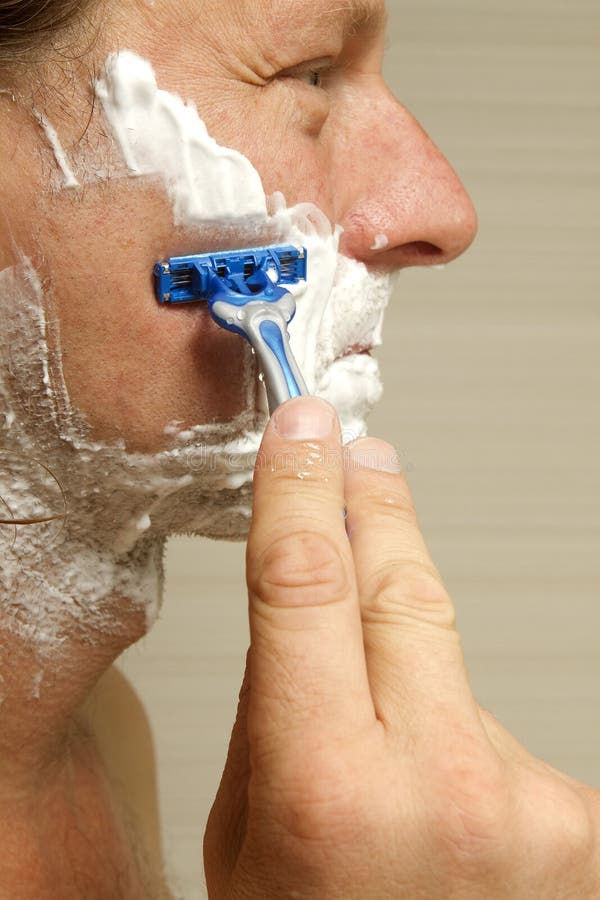 Close-Up of Man Shaving His Face Stock Photo - Image of shaving, hair ...
