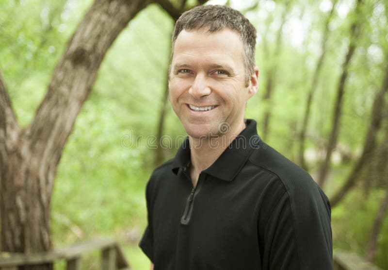 Close-up of a Man Smiling Outside Stock Image - Image of contemporary ...