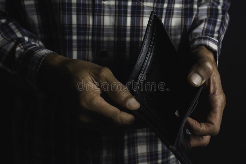 Close-up for a Man Standing and Holding Empty Wallet. Wallet Out of ...