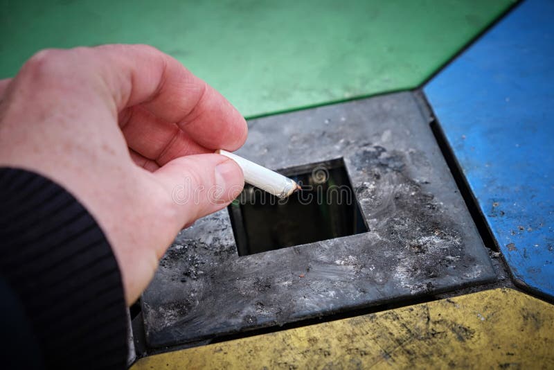 Close-up of a Man Throwing a Cigarette Stock Photo - Image of nicotine ...