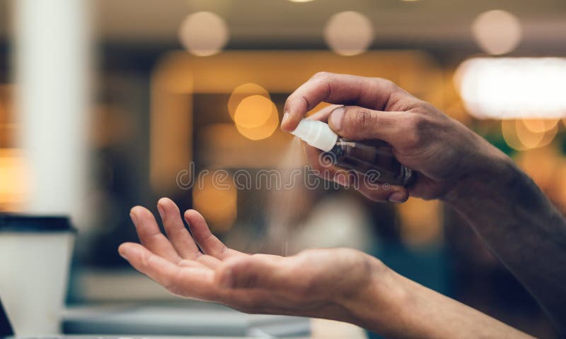 Close Up. Man Uses an Antiseptic Hand Spray Stock Image - Image of busy ...