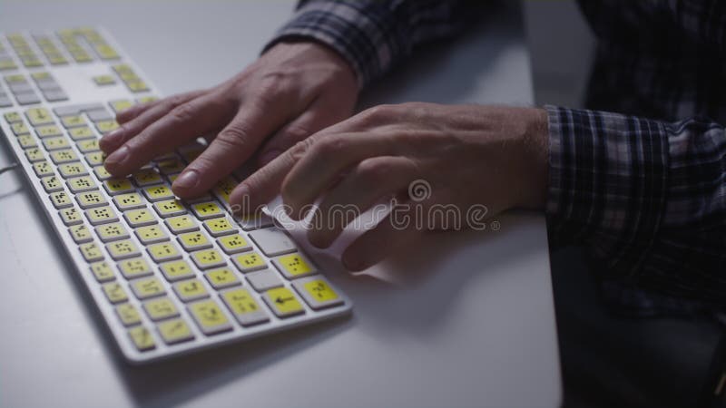 Close-up: a Man Uses a Keyboard with Braille.a Blind Man is Typing ...