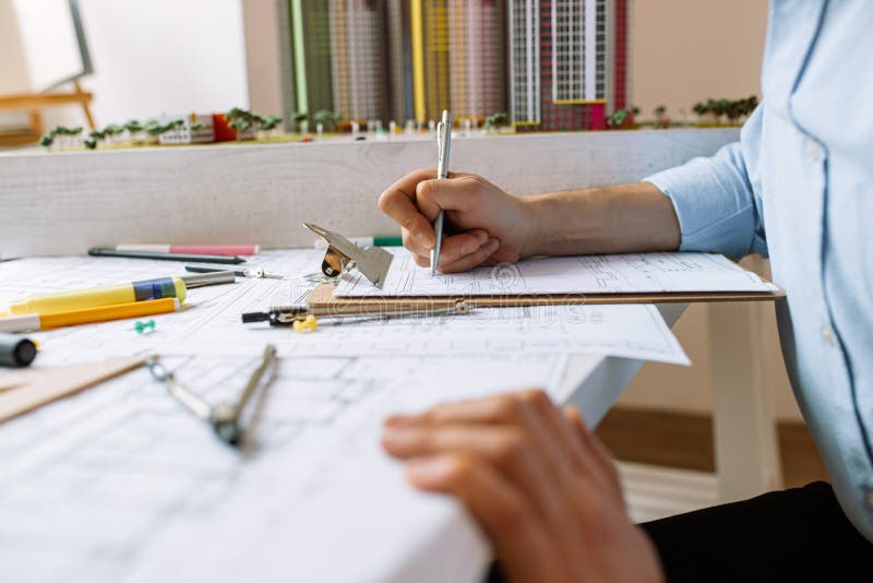 Close-up Man Using Blueprints in Office Stock Photo - Image of interior ...