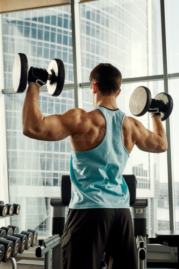 Close Up of Man Using Dumbbell Exercise at Gym, Sport Concept Stock ...