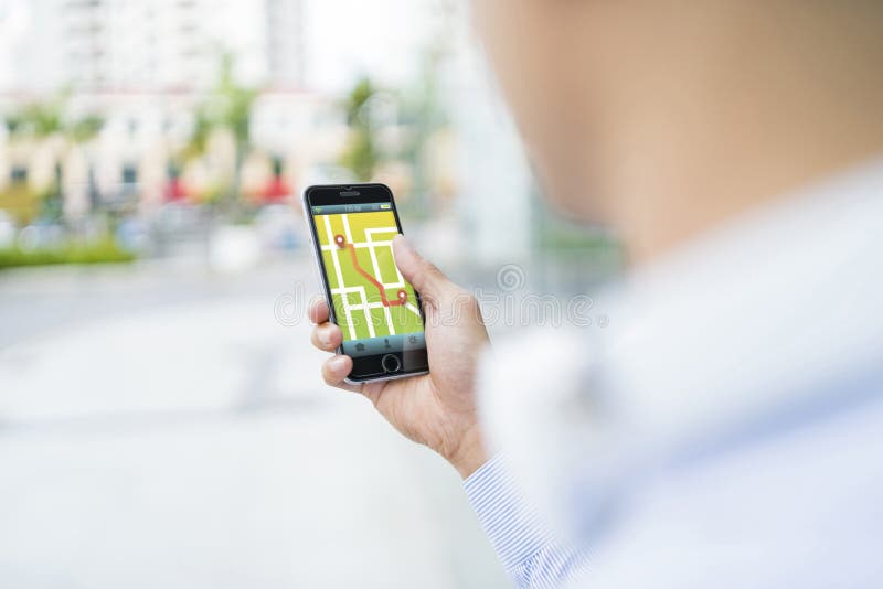 Man Using Gps Navigation on His Phone Stock Photo - Image of malaysia ... Man Using Gps Navigation on His Phone Stock Photo - Image of malaysia ...