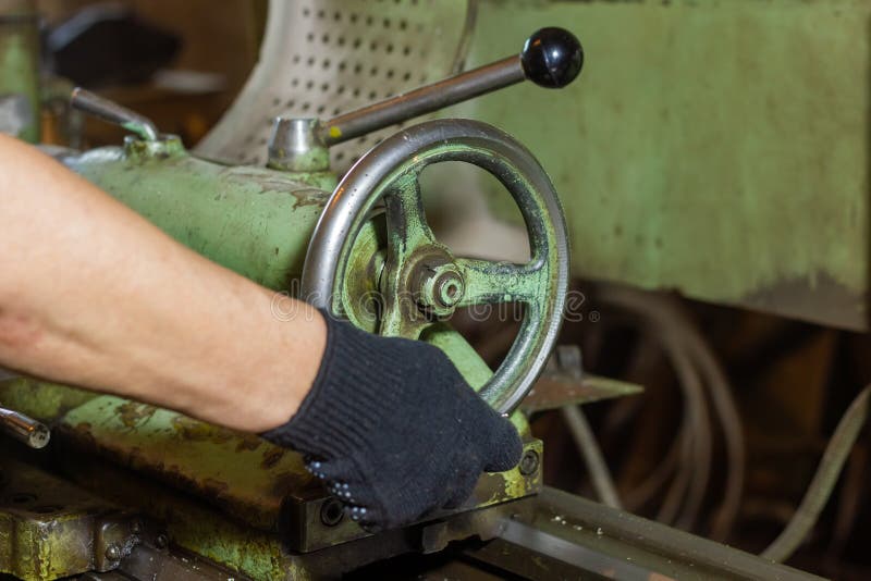 Close Up of a Man Using a Machine, Close Up of a Man Working on a ...