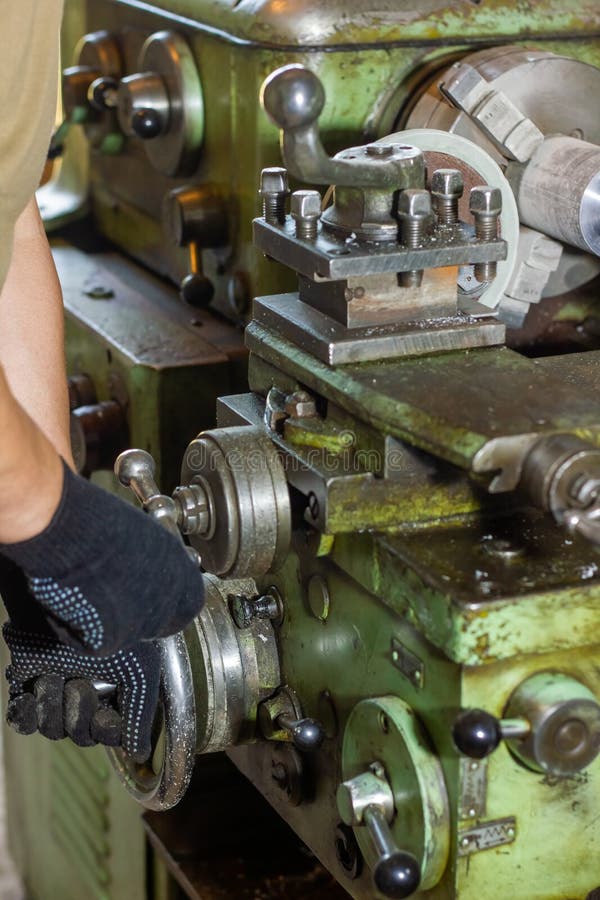 Close Up of a Man Using a Machine, Close Up of a Man Working on a ...