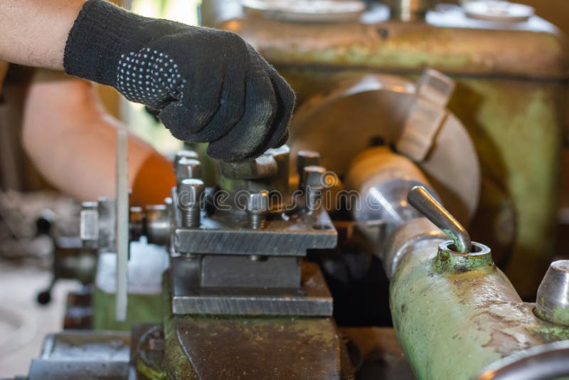 Close Up of a Man Using a Machine, Close Up of a Man Working on a ...