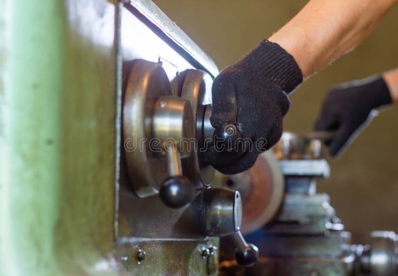 Close Up of a Man Using a Machine, Close Up of a Man Working on a ...