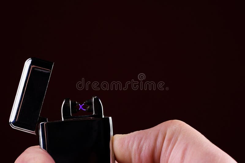 Close Up of Man Using a Plasma Arc Lighter. Stock Image - Image of ...
