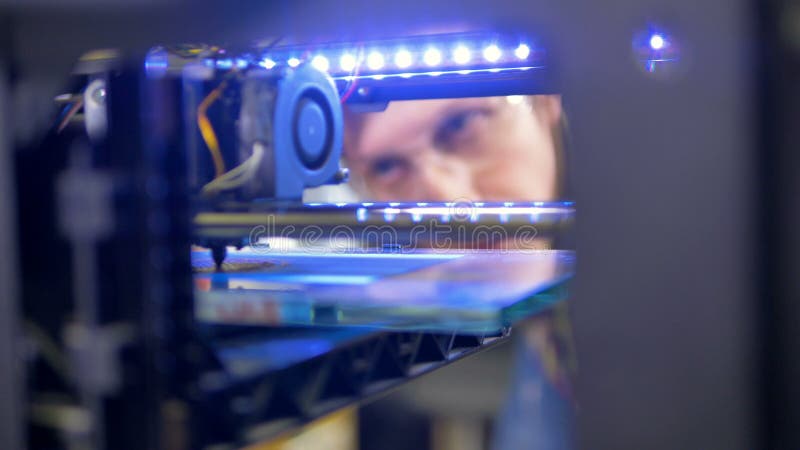 Close Up of the Man Watching the Process of 3D Printing with Plastic ...