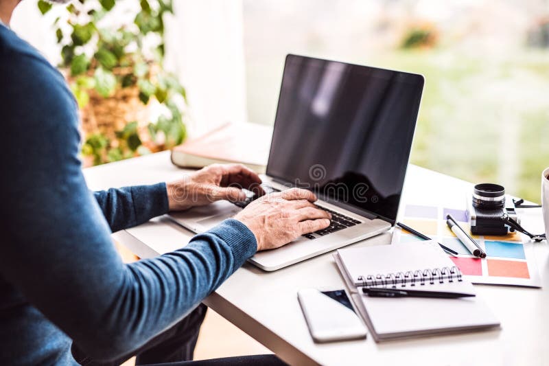 Close Up of Man Working from Home Office, Sitting at Desk with Computer ...