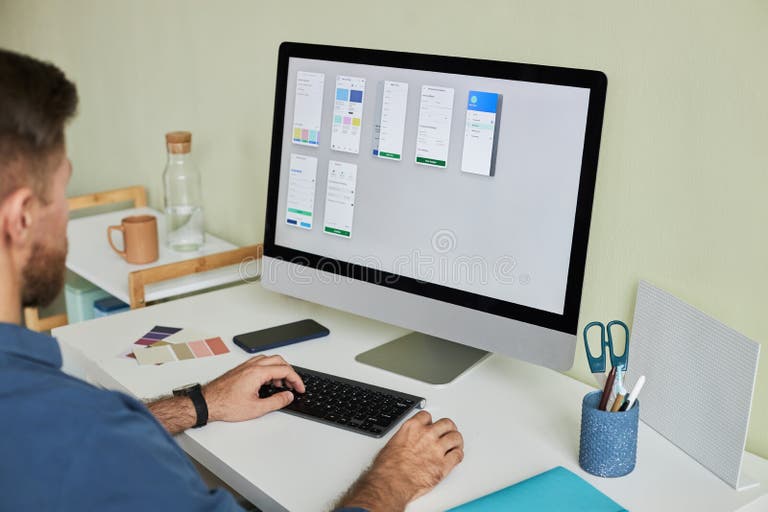 Close Up of Man Working with PC Computer at Workplace Developing Mobile ...