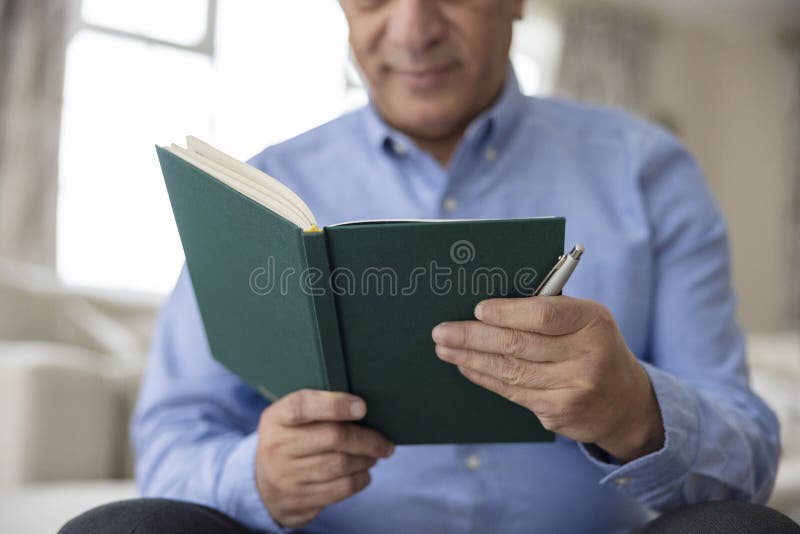 Close Up of Man Writing in Diary or Journal at Home Stock Image - Image ...