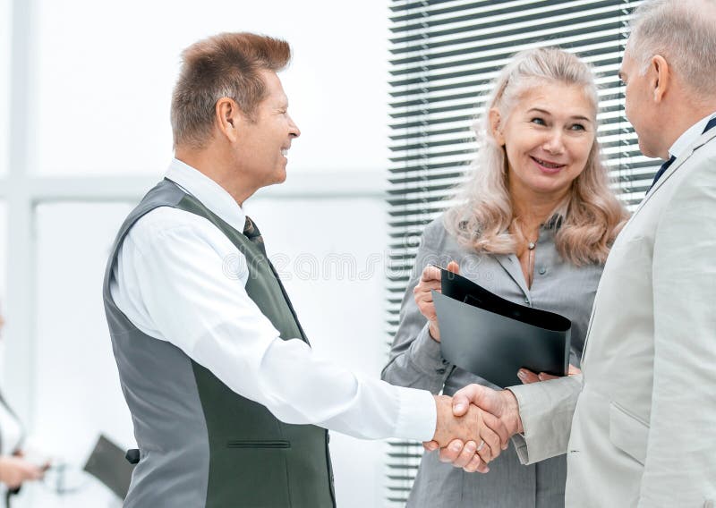 Close Up. Manager and Customer Shaking Hands Stock Image - Image of ...