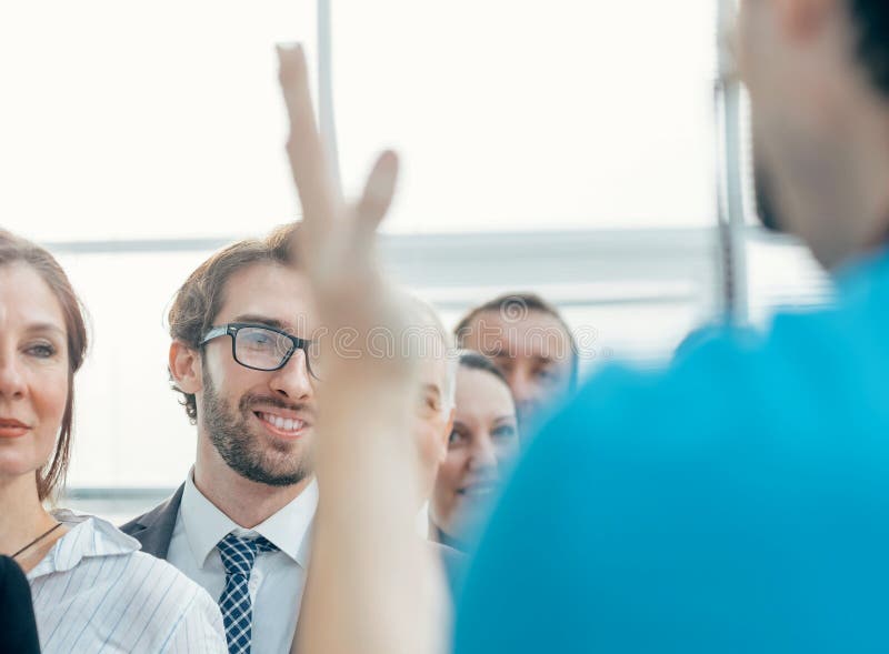 Close Up. Manager Explaining Something To a Group of Employees Stock ...