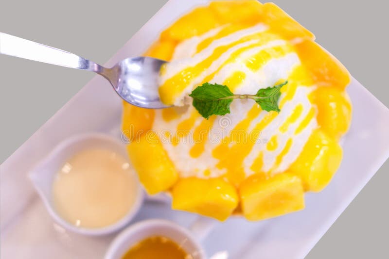Close Up Mango Bing Su with Sauces in White Plate Stock Photo - Image ...