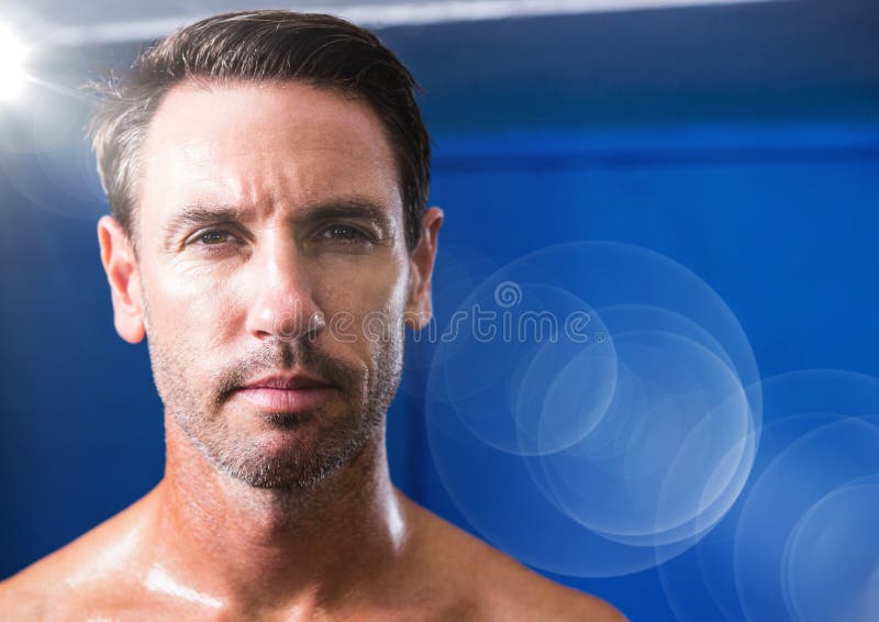 Close Up of Mans Face with Flare Against Blue Background Stock ...