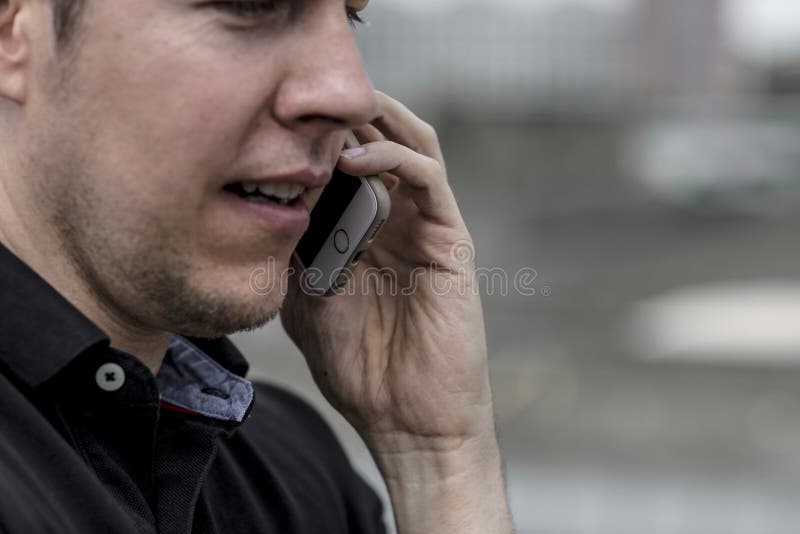 Close Up of Man Talking on a Mobile Phone Stock Photo - Image of ...