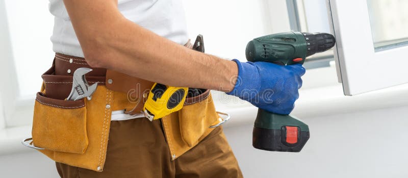 Close Up of a Mans Hand Holding Screwdriver Machine Stock Image - Image ...