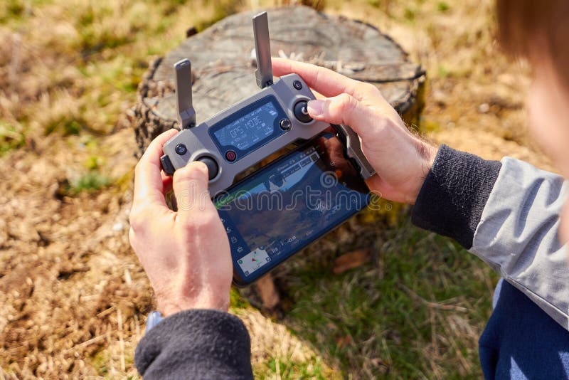 Close Up Mans Hands Holding a Drones Remote Controller. a Aerial Shoot ...