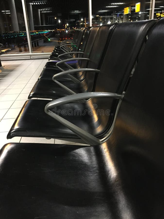 Close Up of the Many Chairs at an Empty Hall at the Airport at Night ...