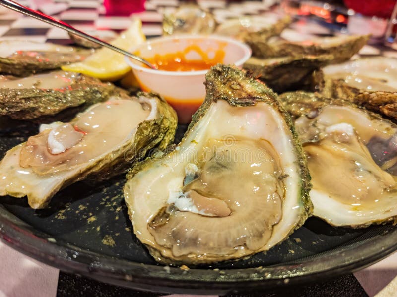Close Up of Many Half Shell Raw Oyster Stock Photo - Image of america ...