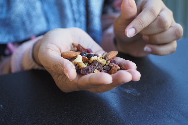 Close Up of Many Mixed Nuts on Hand Stock Photo - Image of calcium ...
