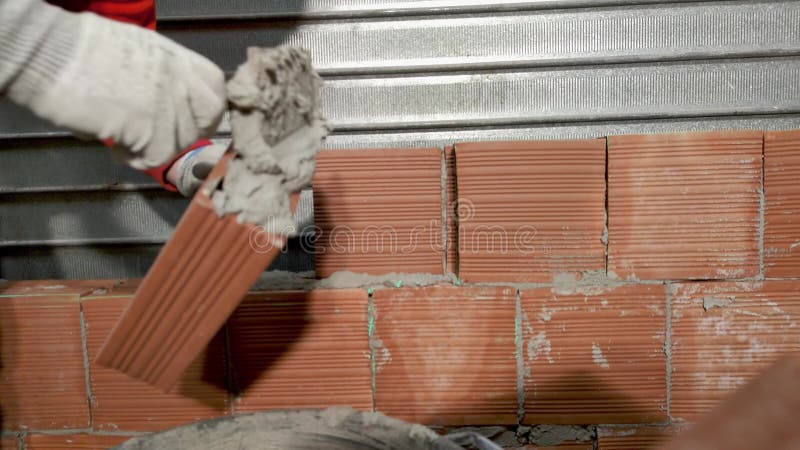 Close-up of Masonry at Construction Site, Bricklayer Works As Trowel ...