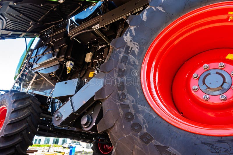 Close-up of a Massive Agriculture Machine with a Red Wheel Ready To Do ...