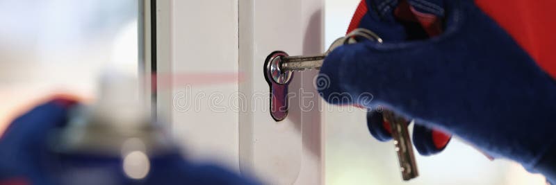 Master in Gloves Checking Pvc Windows Locks with Keys Stock Photo ...