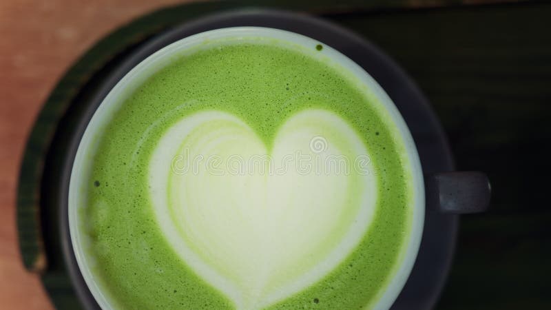Close Up of a Matcha Latte on a Black Tray at a Ca Stock Video - Video ...