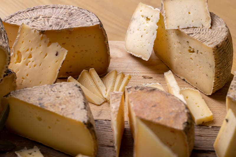Close Up of Maturated Selection of Cheese on Old Wood Stock Photo ...