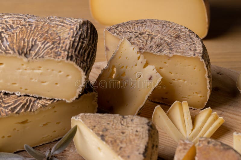 Close Up of Maturated Selection of Cheese on Old Wood Stock Photo ...