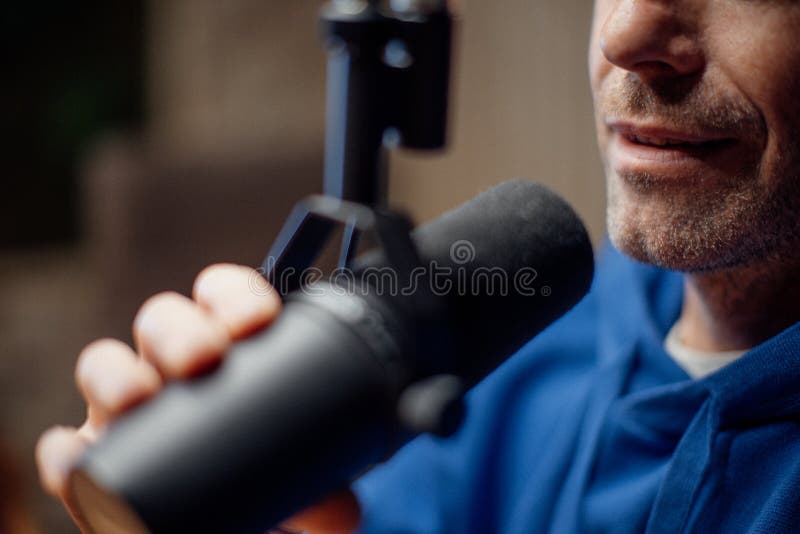 Close-up of Mature Man Speaking in Microphone during Moderating Podcast ...