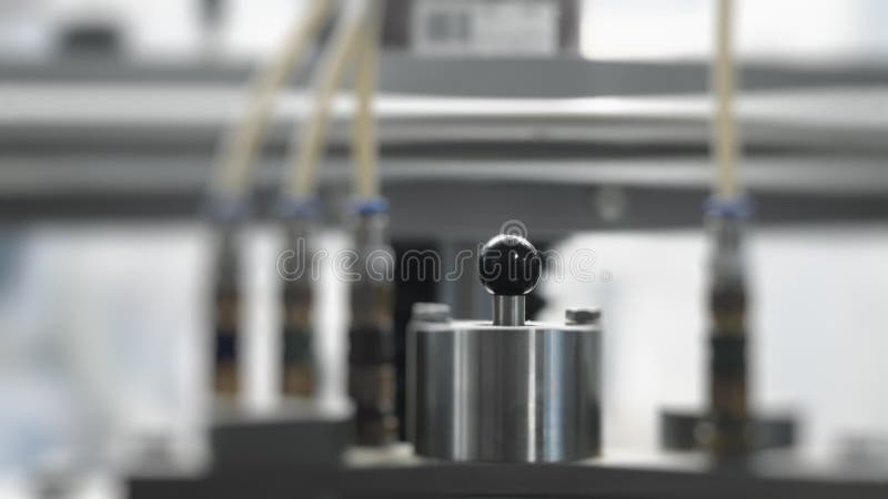 Close-up of a Mechanism in a Factory. Part of a Machine for Packaging ...