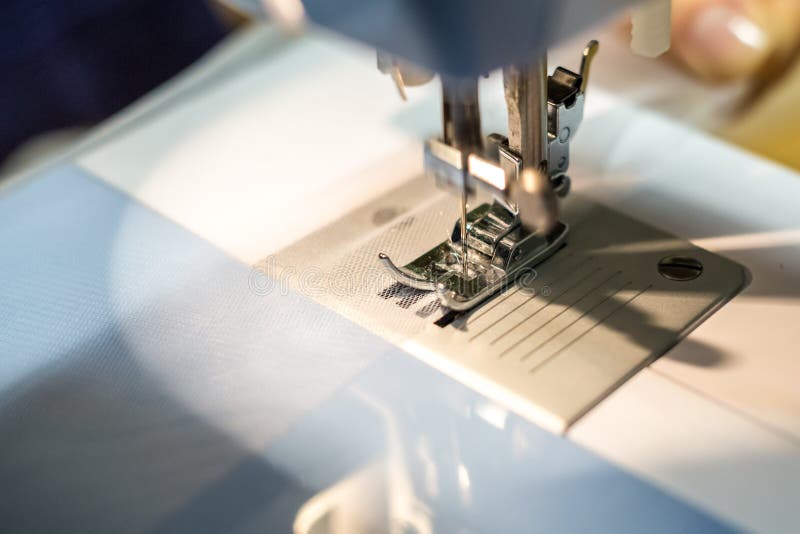 Close Up Mechanism of Sewing Machine Foot with Needle and Thread Stock ...