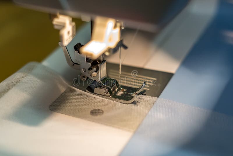 Close Up Mechanism of Sewing Machine Foot with Needle and Thread Stock ...