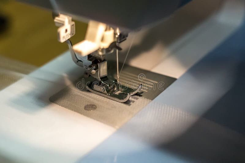 Close Up Mechanism of Sewing Machine Foot with Needle and Thread Stock ...