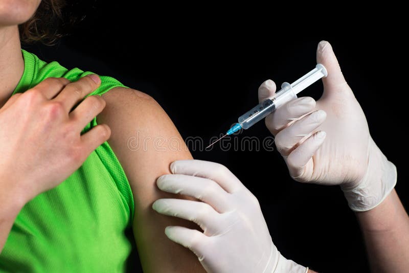 Close-up of a Medical Man Doing an Injection Stock Photo - Image of ...