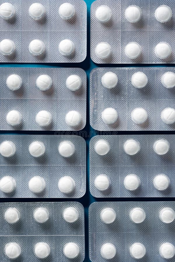 Medication Tablets Packed in Blister Pack on a Table Stock Photo ...