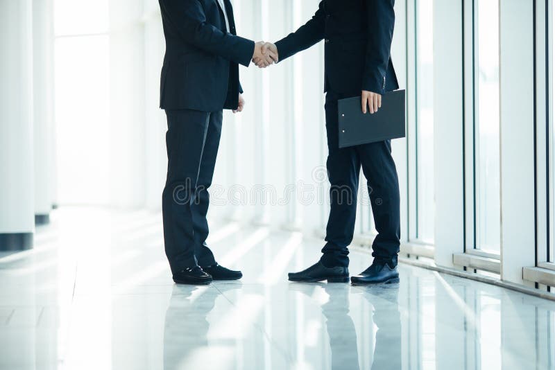 Close up of men handshake stock photo. Image of consulting - 83643388