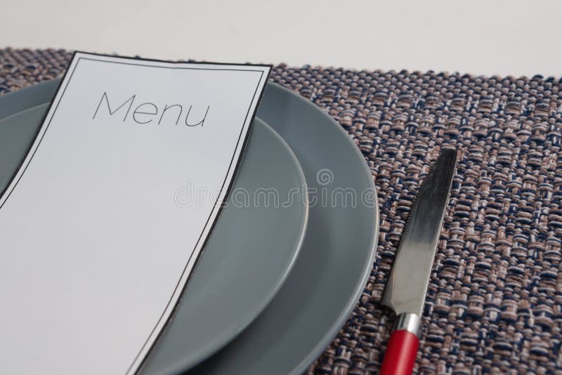 Menu card on table setting stock photo. Image of material - 104577542
