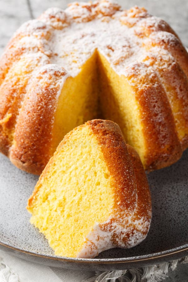 Close-up of Meskouta Orange Pound Cake with Powdered Sugar on a Plate ...