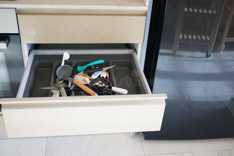 Close Up of Messy Kitchen Utensil Drawer. Stock Image - Image of press ...